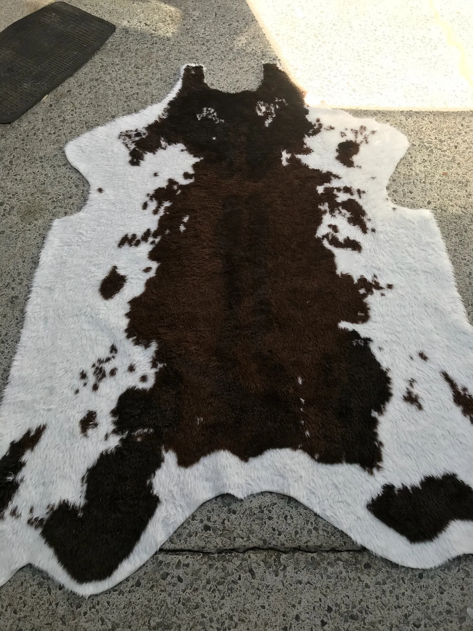 Faux cow skin rugs - assorted | Gold Coast One Stop Event Hire Company